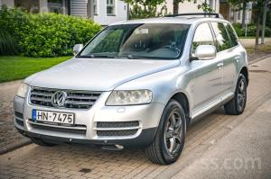 Pelēks Volkswagen Touareg 2005 Rīga, ar dzinēja tilpumu 3.00 L un nobraukumu 297 tūkst. km par 2590 €, foto  vietnē AUTOMOTO.COM.LV