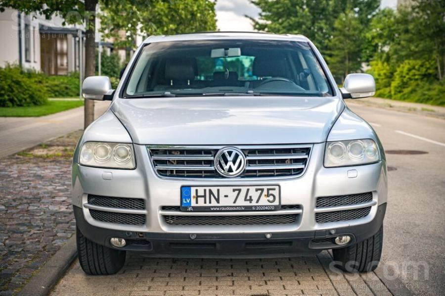 Grey Volkswagen Touareg 2005 in Riga, with an engine capacity of 3.00 L and mileage of 297 thousand km for 2590 €, photo 3 on AUTOMOTO.COM.LV