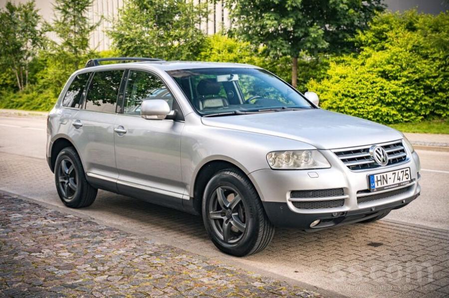 Grey Volkswagen Touareg 2005 in Riga, with an engine capacity of 3.00 L and mileage of 297 thousand km for 2590 €, photo 4 on AUTOMOTO.COM.LV