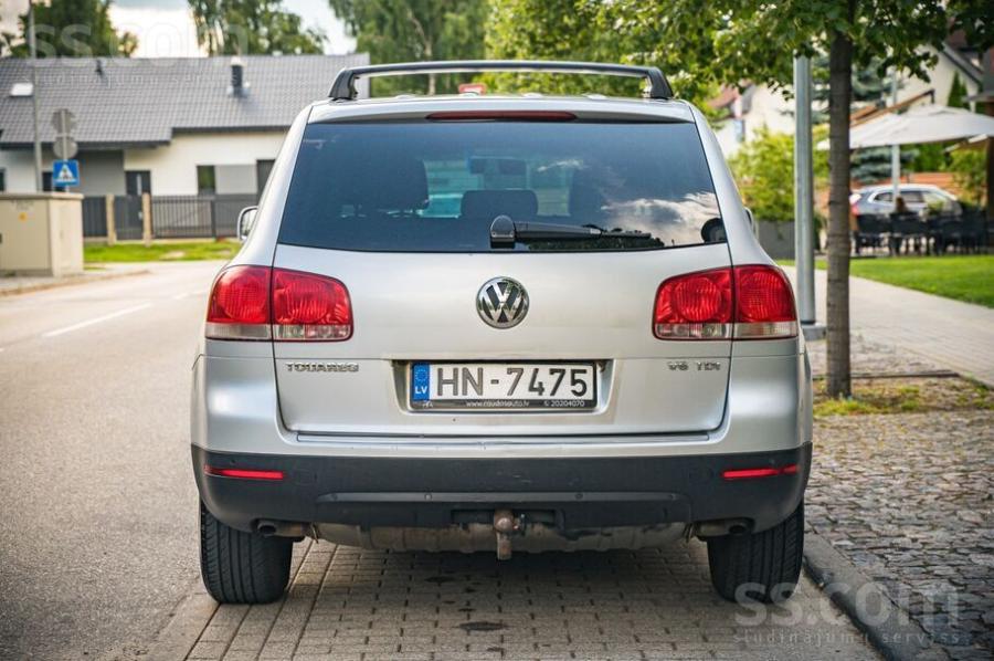 Grey Volkswagen Touareg 2005 in Riga, with an engine capacity of 3.00 L and mileage of 297 thousand km for 2590 €, photo 6 on AUTOMOTO.COM.LV