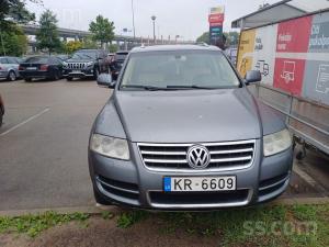 Grey Volkswagen Touareg 2005 in Riga, with an engine capacity of 2.50 L and mileage of 391 thousand km for 2300 €, photo  on AUTOMOTO.COM.LV
