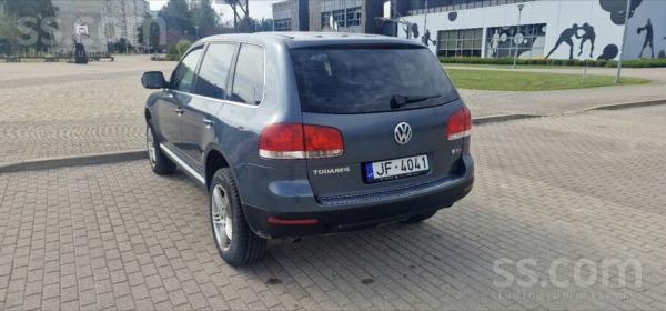 Grey Volkswagen Touareg 2006 in Riga, with an engine capacity of 3.00 L and mileage of 392 thousand km for 2800 €, photo 2 on AUTOMOTO.COM.LV