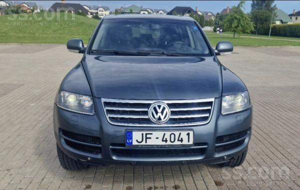 Grey Volkswagen Touareg 2006 in Riga, with an engine capacity of 3.00 L and mileage of 392 thousand km for 2800 €, photo 4 on AUTOMOTO.COM.LV