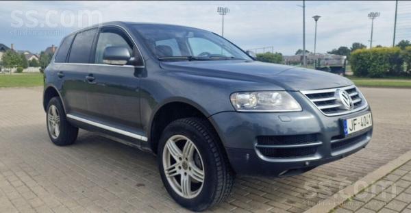 Grey Volkswagen Touareg 2006 in Riga, with an engine capacity of 3.00 L and mileage of 392 thousand km for 2800 €, photo 5 on AUTOMOTO.COM.LV