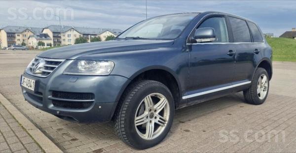 Grey Volkswagen Touareg 2006 in Riga, with an engine capacity of 3.00 L and mileage of 392 thousand km for 2800 €, photo 7 on AUTOMOTO.COM.LV