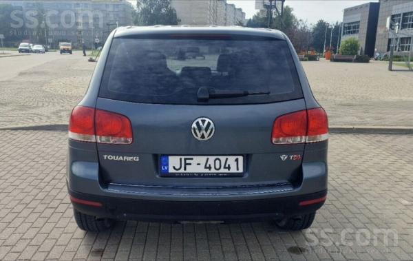Grey Volkswagen Touareg 2006 in Riga, with an engine capacity of 3.00 L and mileage of 392 thousand km for 2800 €, photo 8 on AUTOMOTO.COM.LV