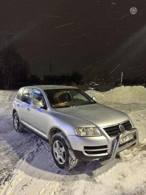 Grey Volkswagen Touareg 2006 in Vilnius, with an engine capacity of 2.46 L and mileage of 300 thousand km for 2450 €, photo  on AUTOMOTO.COM.LV