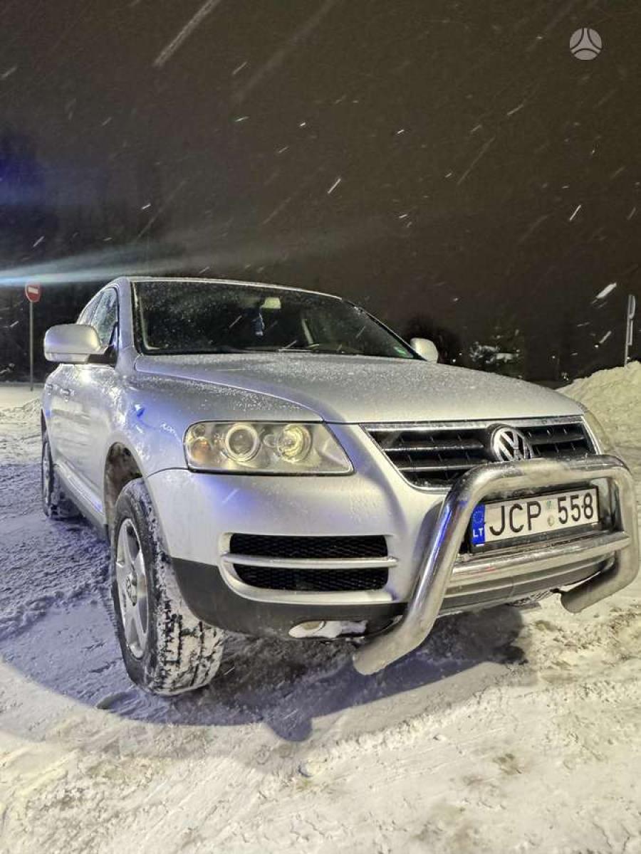 Grey Volkswagen Touareg 2006 in Vilnius, with an engine capacity of 2.46 L and mileage of 300 thousand km for 2450 €, photo 14 on AUTOMOTO.COM.LV
