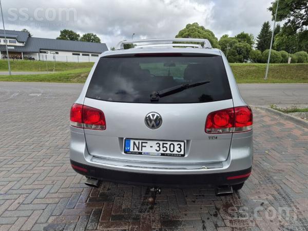 Grey Volkswagen Touareg 2006 in Aluksne, with an engine capacity of 3.00 L and mileage of 344 thousand km for 3500 €, photo 7 on AUTOMOTO.COM.LV