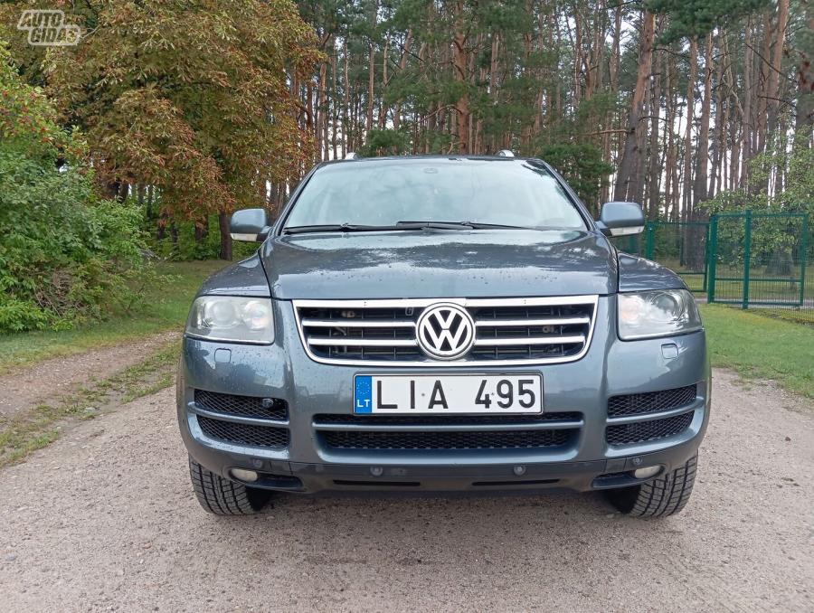 Grey Volkswagen Touareg 2006 in Ukmerge, with an engine capacity of 3.00 L and mileage of 403 thousand km for 3200 €, photo 4 on AUTOMOTO.COM.LV
