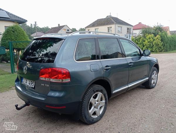 Pelēks Volkswagen Touareg 2006 Ukmergė, ar dzinēja tilpumu 3.00 L un nobraukumu 403 tūkst. km par 3200 €, foto 6 vietnē AUTOMOTO.COM.LV