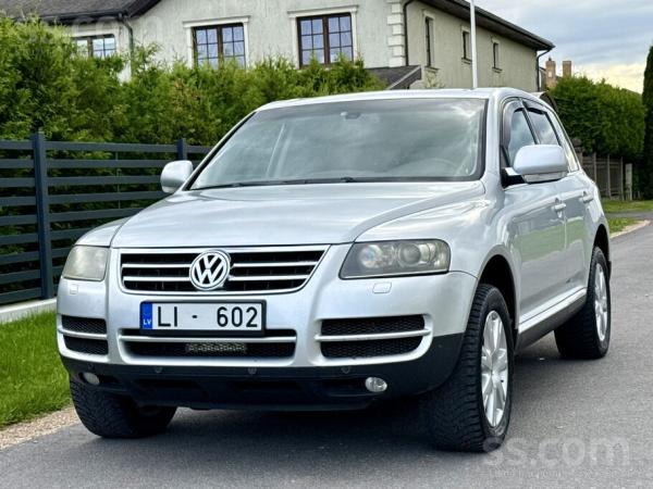 Pelēks Volkswagen Touareg 2006 Rīga, ar dzinēja tilpumu 3.00 L un nobraukumu 370 tūkst. km par 2950 €, foto 1 vietnē AUTOMOTO.COM.LV