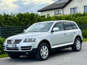Pelēks Volkswagen Touareg 2006 Rīga, ar dzinēja tilpumu 3.00 L un nobraukumu 370 tūkst. km par 2950 €, foto 3 vietnē AUTOMOTO.COM.LV