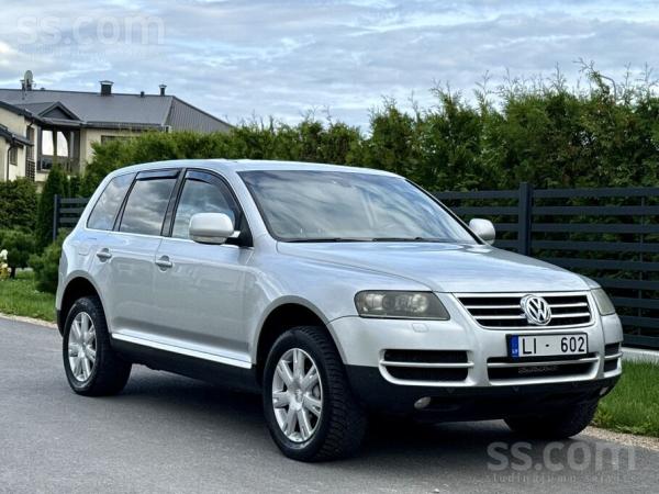 Pelēks Volkswagen Touareg 2006 Rīga, ar dzinēja tilpumu 3.00 L un nobraukumu 370 tūkst. km par 2950 €, foto 6 vietnē AUTOMOTO.COM.LV