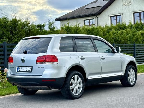Pelēks Volkswagen Touareg 2006 Rīga, ar dzinēja tilpumu 3.00 L un nobraukumu 370 tūkst. km par 2950 €, foto 8 vietnē AUTOMOTO.COM.LV