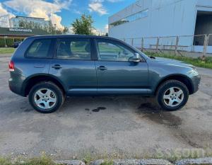 Pelēks Volkswagen Touareg 2006 Rīga, ar dzinēja tilpumu 2.50 L un nobraukumu 298 tūkst. km par 3600 €, foto 7 vietnē AUTOMOTO.COM.LV