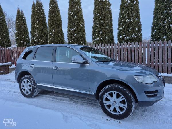 Grey Volkswagen Touareg 2007 in Vilnius, with an engine capacity of 3.00 L and mileage of 309 thousand km for 6800 €, photo 3 on AUTOMOTO.COM.LV