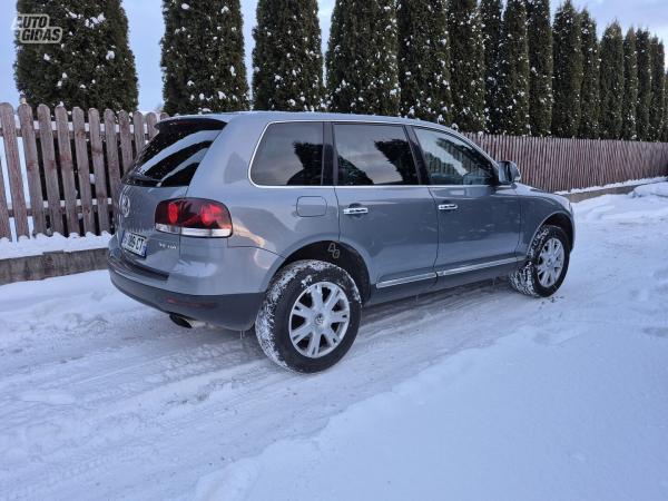 Grey Volkswagen Touareg 2007 in Vilnius, with an engine capacity of 3.00 L and mileage of 309 thousand km for 6800 €, photo 4 on AUTOMOTO.COM.LV