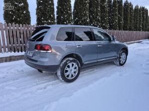 Grey Volkswagen Touareg 2007 in Vilnius, with an engine capacity of 3.00 L and mileage of 309 thousand km for 6800 €, photo 4 on AUTOMOTO.COM.LV