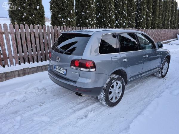 Grey Volkswagen Touareg 2007 in Vilnius, with an engine capacity of 3.00 L and mileage of 309 thousand km for 6800 €, photo 5 on AUTOMOTO.COM.LV