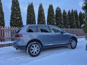 Grey Volkswagen Touareg 2007 in Vilnius, with an engine capacity of 3.00 L and mileage of 309 thousand km for 6800 €, photo 6 on AUTOMOTO.COM.LV