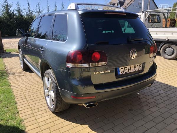 Grey Volkswagen Touareg 2007 in Vilnius, with an engine capacity of 3.00 L and mileage of 220 thousand km for 7900 €, photo 5 on AUTOMOTO.COM.LV