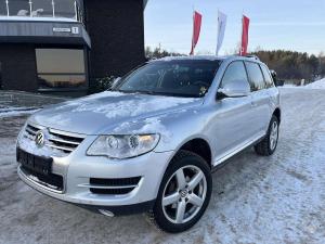 Pelēks Volkswagen Touareg 2007 Viļņa, ar dzinēja tilpumu 2.97 L un nobraukumu 263 tūkst. km par 6699 €, foto  vietnē AUTOMOTO.COM.LV