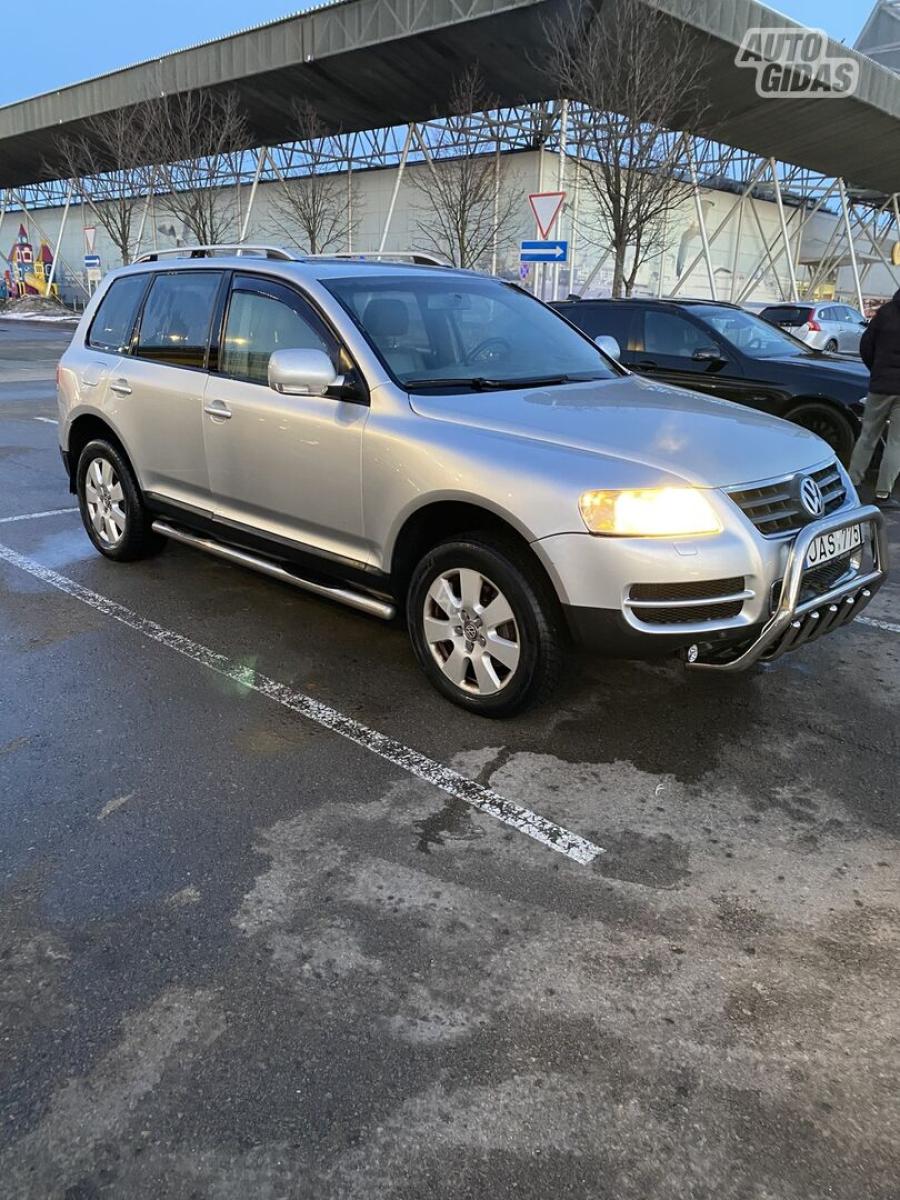 Grey Volkswagen Touareg 2007 in Klaipeda, with an engine capacity of 3.00 L and mileage of 310 thousand km for 3100 €, photo 1 on AUTOMOTO.COM.LV