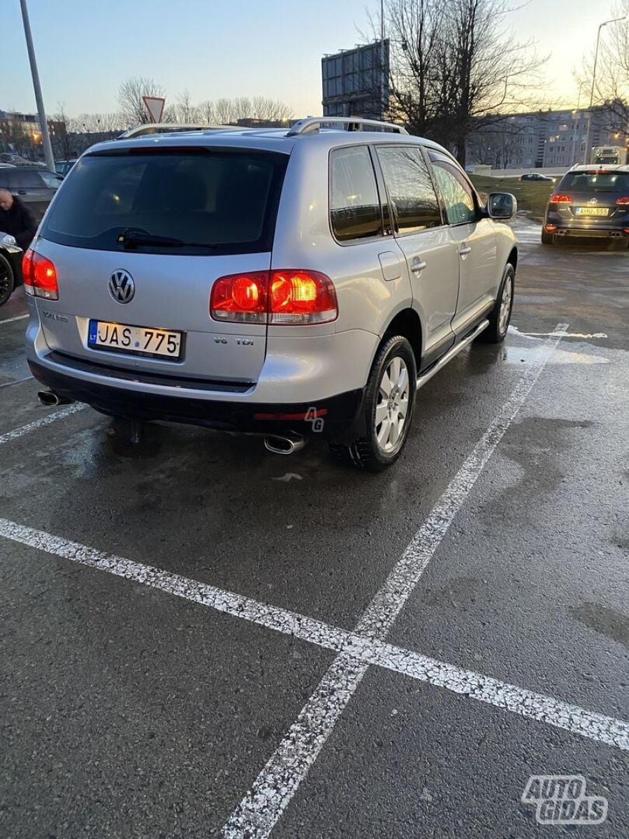 Grey Volkswagen Touareg 2007 in Klaipeda, with an engine capacity of 3.00 L and mileage of 310 thousand km for 3100 €, photo 4 on AUTOMOTO.COM.LV
