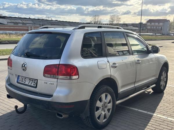 Grey Volkswagen Touareg 2007 in Kaunas, with an engine capacity of 3.00 L and mileage of 300 thousand km for 2350 €, photo 3 on AUTOMOTO.COM.LV