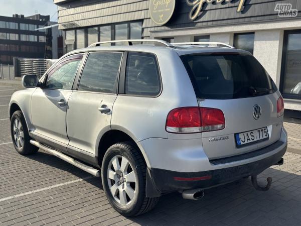 Grey Volkswagen Touareg 2007 in Kaunas, with an engine capacity of 3.00 L and mileage of 300 thousand km for 2350 €, photo 4 on AUTOMOTO.COM.LV