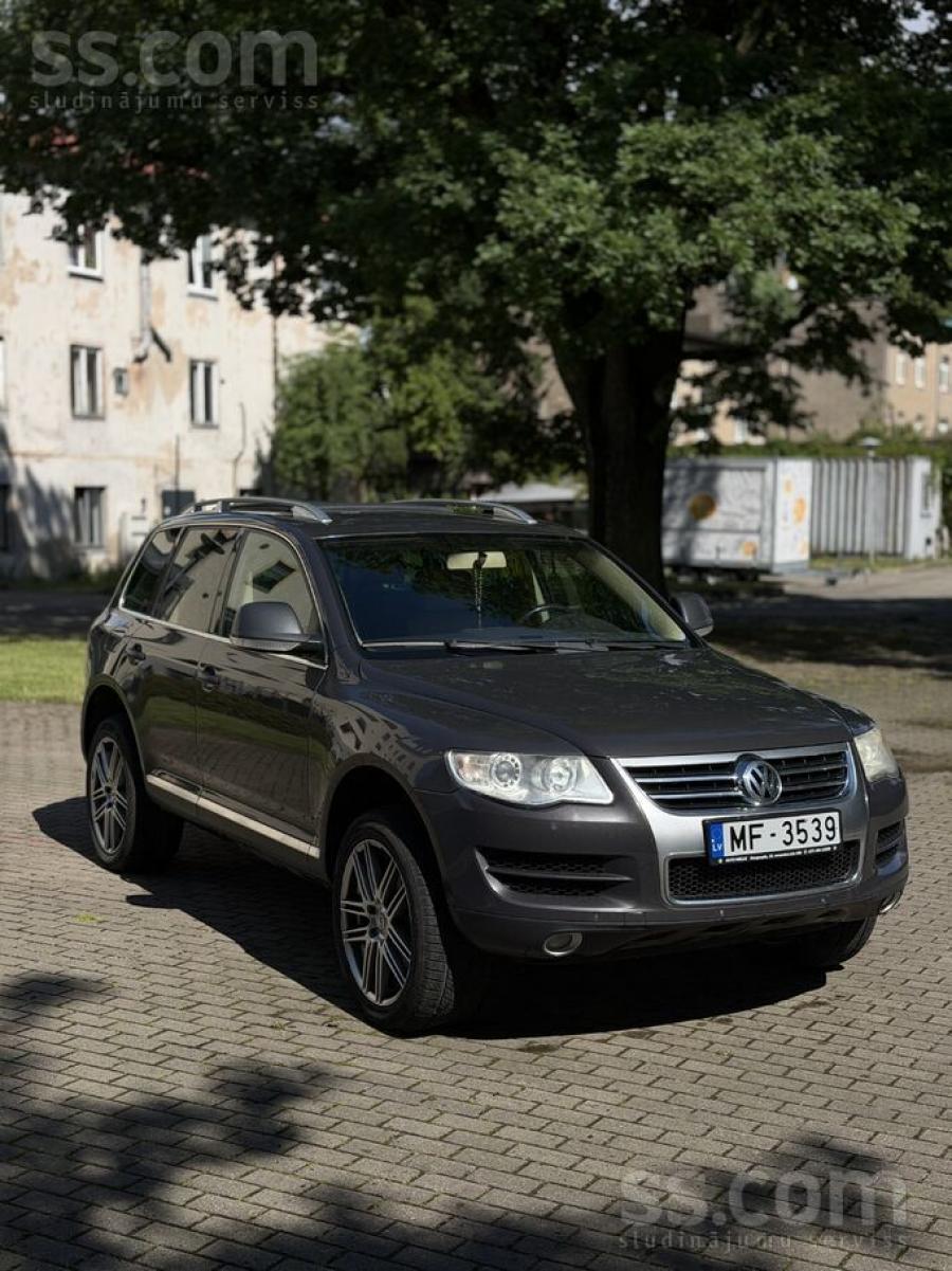 Pelēks Volkswagen Touareg 2007 Rīga, ar dzinēja tilpumu 3.00 L un nobraukumu 175 tūkst. km par 6450 €, foto 1 vietnē AUTOMOTO.COM.LV