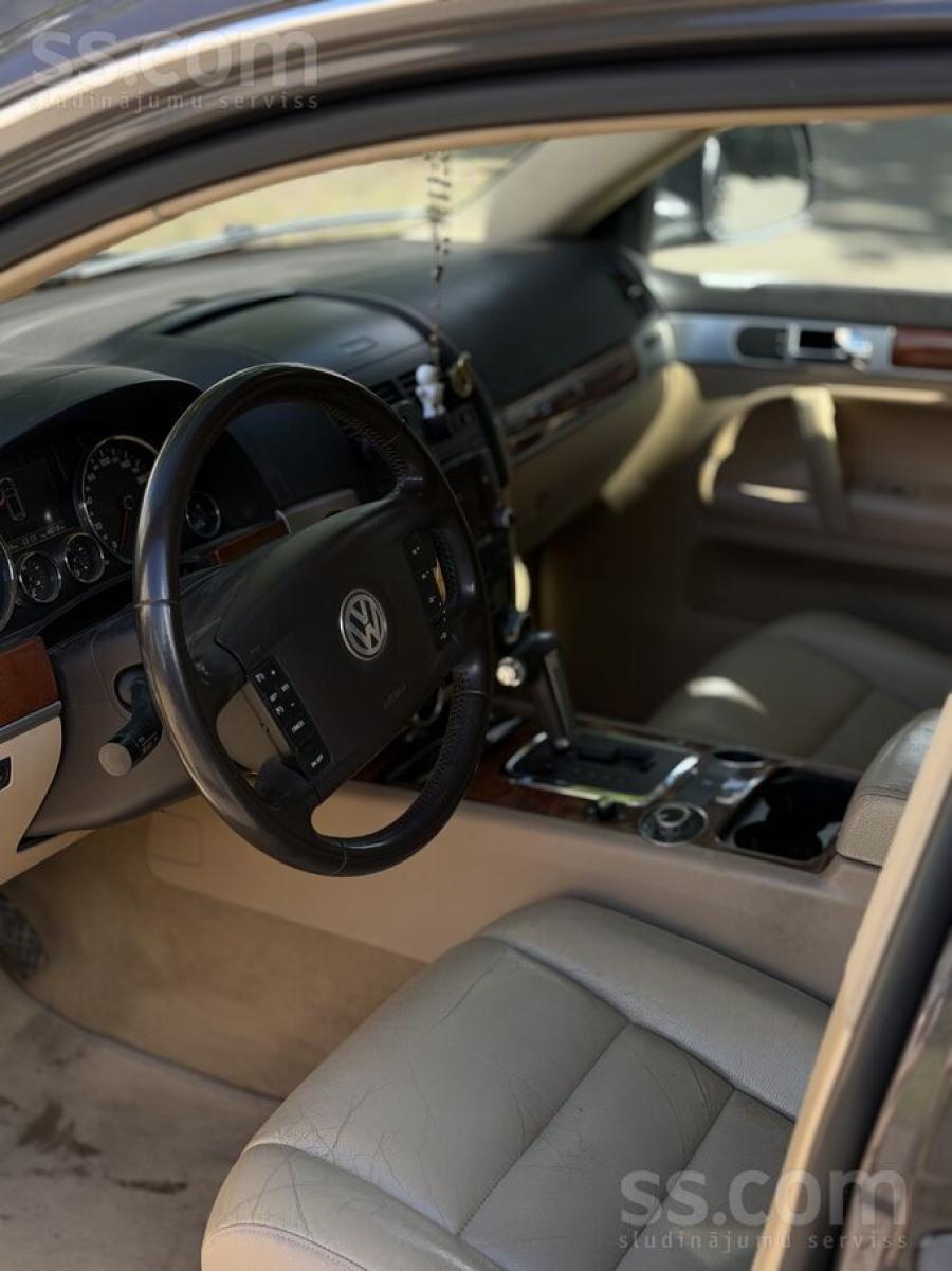 Pelēks Volkswagen Touareg 2007 Rīga, ar dzinēja tilpumu 3.00 L un nobraukumu 175 tūkst. km par 6450 €, foto 7 vietnē AUTOMOTO.COM.LV