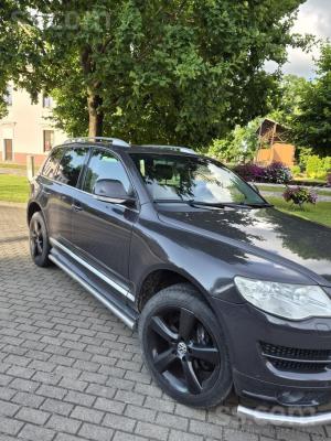 Pelēks Volkswagen Touareg 2007 Rīga, ar dzinēja tilpumu 3.00 L un nobraukumu 365 tūkst. km par 5900 €, foto 14 vietnē AUTOMOTO.COM.LV