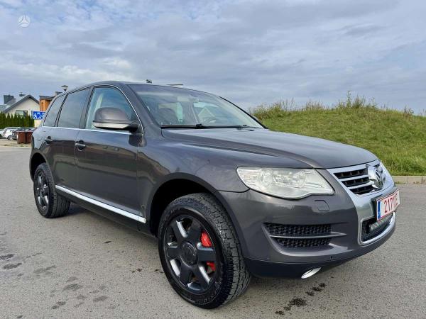 Grey Volkswagen Touareg 2007 in Kaunas, with an engine capacity of 2.97 L and mileage of 392 thousand km for 4200 €, photo 7 on AUTOMOTO.COM.LV