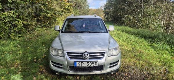 Volkswagen Touareg 2007 in Liepaja on AUTOMOTO.COM.LV Grey Volkswagen Touareg 2007 in Liepaja, with an engine capacity of 3.00 L and mileage of 410 thousand km for 1950 €, photo 7 on AUTOMOTO.COM.LV