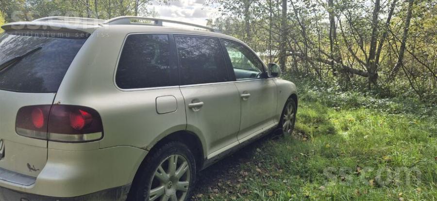 Pelēks Volkswagen Touareg 2007 Liepāja, ar dzinēja tilpumu 3.00 L un nobraukumu 410 tūkst. km par 1950 €, foto 10 vietnē AUTOMOTO.COM.LV