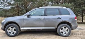 Grey Volkswagen Touareg 2008 in Preili, with an engine capacity of 2.50 L and mileage of 297 thousand km for 3666 €, photo  on AUTOMOTO.COM.LV