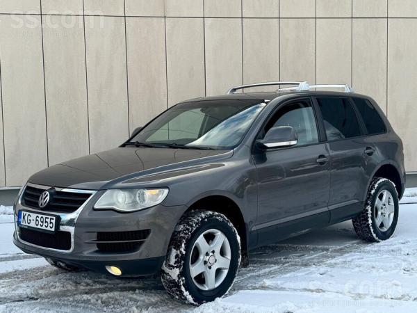 Grey Volkswagen Touareg 2008 in Riga, with an engine capacity of 2.50 L and mileage of 0 thousand km for 3550 €, photo 1 on AUTOMOTO.COM.LV