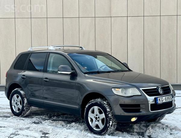 Grey Volkswagen Touareg 2008 in Riga, with an engine capacity of 2.50 L and mileage of 0 thousand km for 3550 €, photo 6 on AUTOMOTO.COM.LV