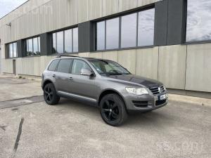 Grey Volkswagen Touareg 2008 in Riga, with an engine capacity of 2.50 L and mileage of 291 thousand km for 3600 €, photo  on AUTOMOTO.COM.LV