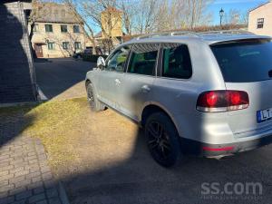 Grey Volkswagen Touareg 2009 in Ventspils, with an engine capacity of 3.00 L and mileage of 386 thousand km for 5500 €, photo  on AUTOMOTO.COM.LV