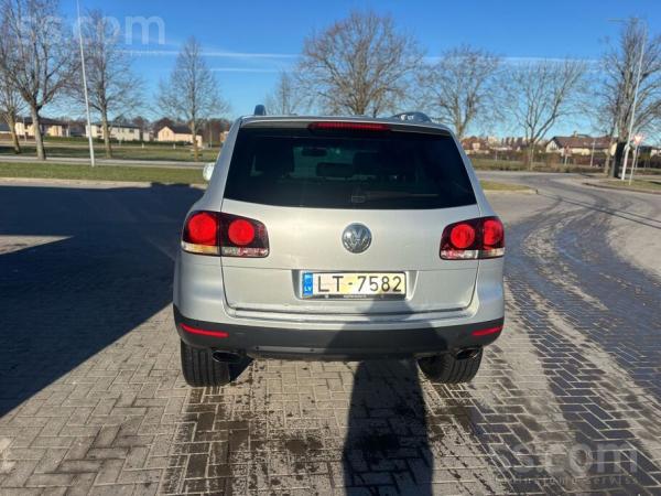 Grey Volkswagen Touareg 2009 in Ventspils, with an engine capacity of 3.00 L and mileage of 386 thousand km for 5500 €, photo 5 on AUTOMOTO.COM.LV