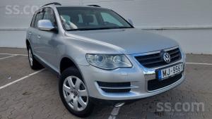 Grey Volkswagen Touareg 2009 in Riga, with an engine capacity of 3.00 L and mileage of 343 thousand km for 4990 €, photo  on AUTOMOTO.COM.LV