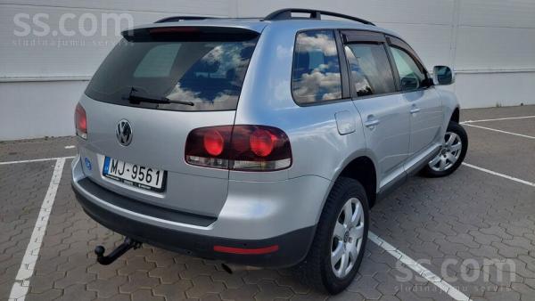 Pelēks Volkswagen Touareg 2009 Rīga, ar dzinēja tilpumu 3.00 L un nobraukumu 343 tūkst. km par 4990 €, foto 5 vietnē AUTOMOTO.COM.LV