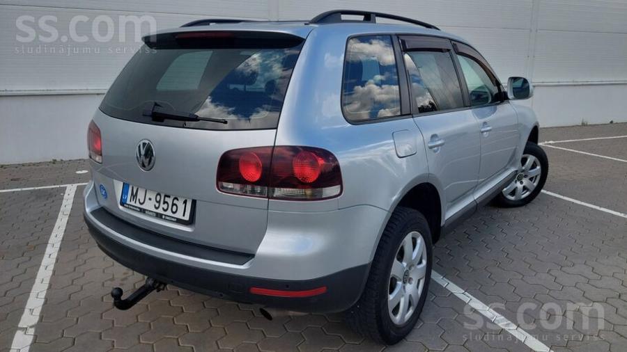 Grey Volkswagen Touareg 2009 in Riga, with an engine capacity of 3.00 L and mileage of 343 thousand km for 4990 €, photo 6 on AUTOMOTO.COM.LV