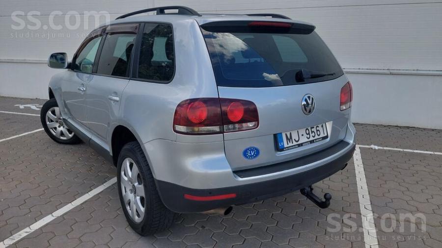 Grey Volkswagen Touareg 2009 in Riga, with an engine capacity of 3.00 L and mileage of 343 thousand km for 4990 €, photo 7 on AUTOMOTO.COM.LV