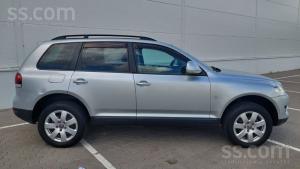 Grey Volkswagen Touareg 2009 in Riga, with an engine capacity of 3.00 L and mileage of 343 thousand km for 4990 €, photo 10 on AUTOMOTO.COM.LV