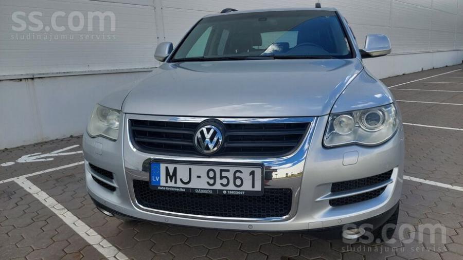 Grey Volkswagen Touareg 2009 in Riga, with an engine capacity of 3.00 L and mileage of 343 thousand km for 4990 €, photo 14 on AUTOMOTO.COM.LV