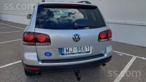 Grey Volkswagen Touareg 2009 in Riga, with an engine capacity of 3.00 L and mileage of 343 thousand km for 4990 €, photo 15 on AUTOMOTO.COM.LV